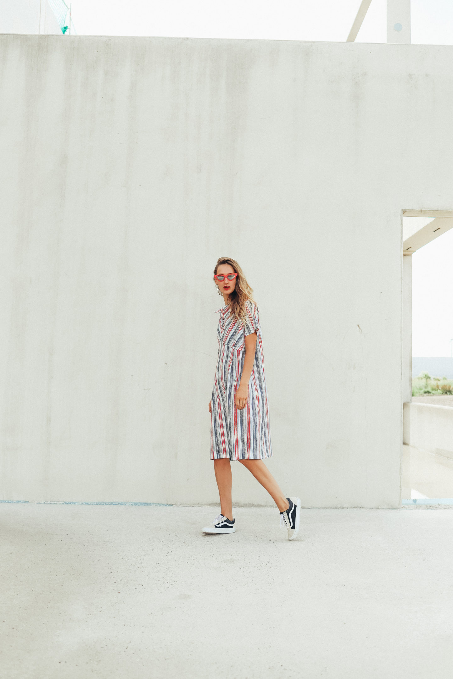 Laura Christmann earrings and secondhand dress. - Eveoaks